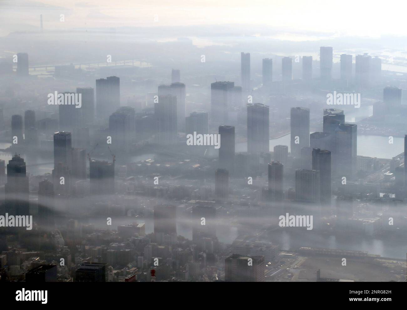 An aerial photo shows Tokyo covered with fog on Dec. 18 2019. According ...