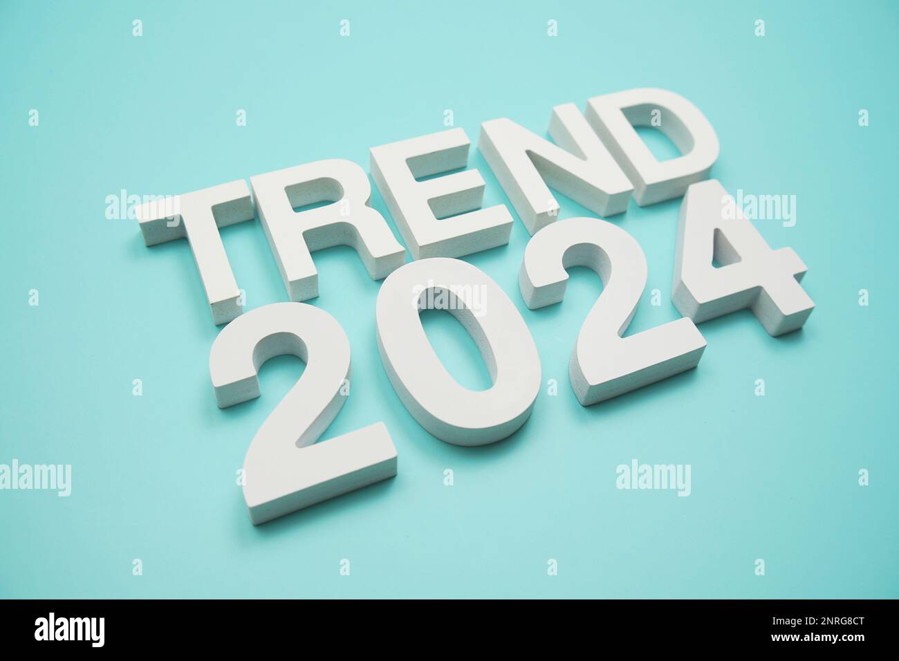 Trend 2024 alphabet letters on blue background Stock Photo - Alamy