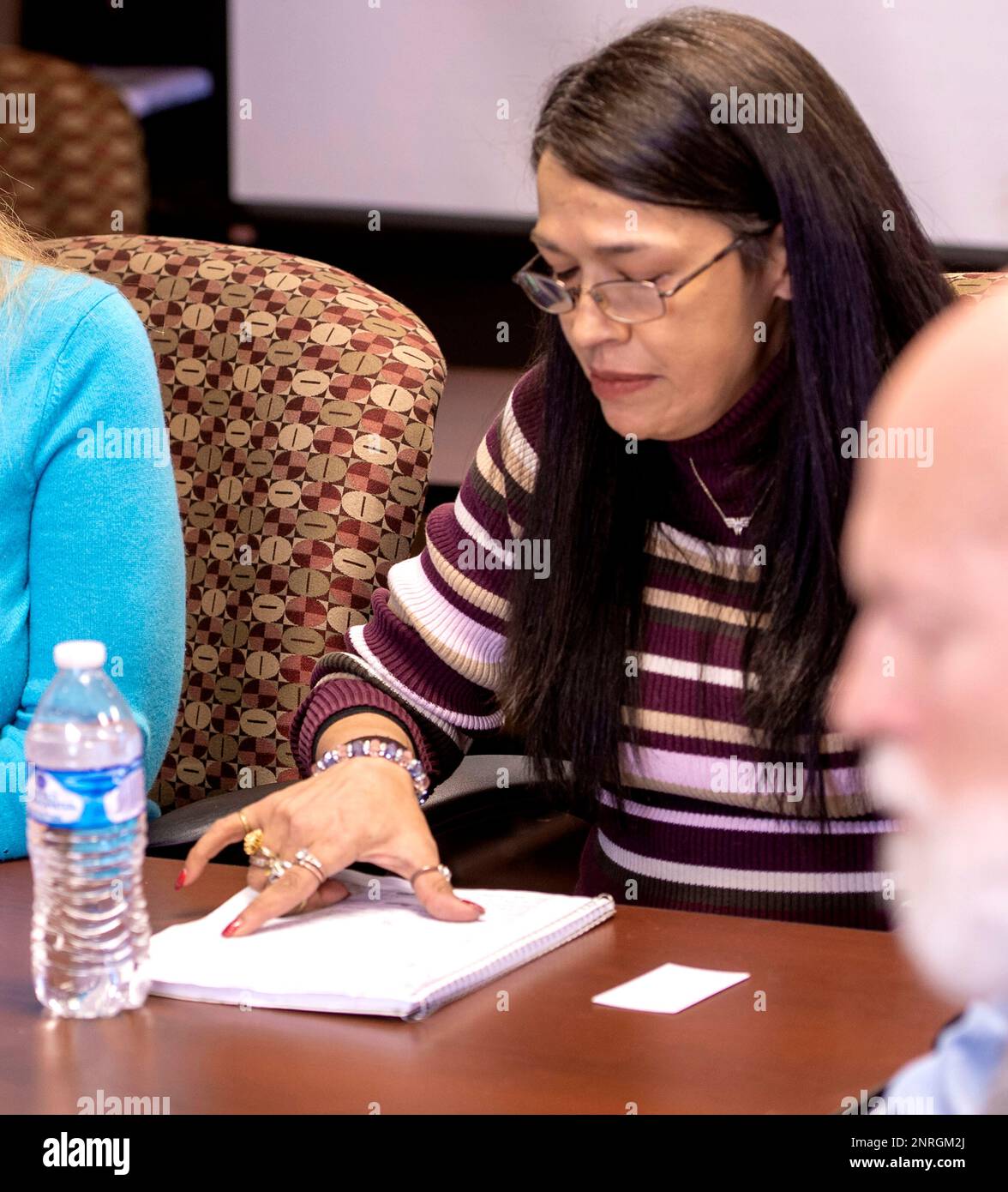 Elsa Garcia reads a statement at the parole hearing of Evangeline Combs ...