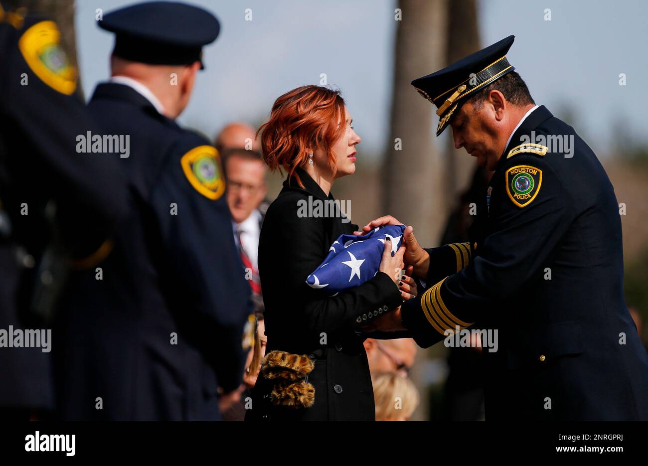 Houston Police Chief Art Acevedo presents the U.S. flag to widow ...