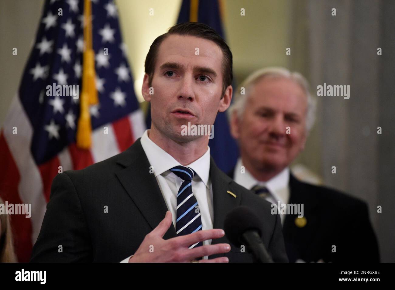 South Carolina state Rep. Bobby Cox, left, speaks after Gov. Henry ...