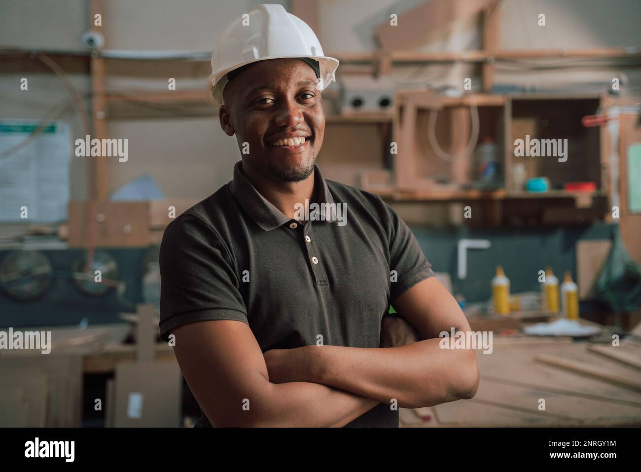 African male happy confident trainee supervisor at work Stock Photo - Alamy
