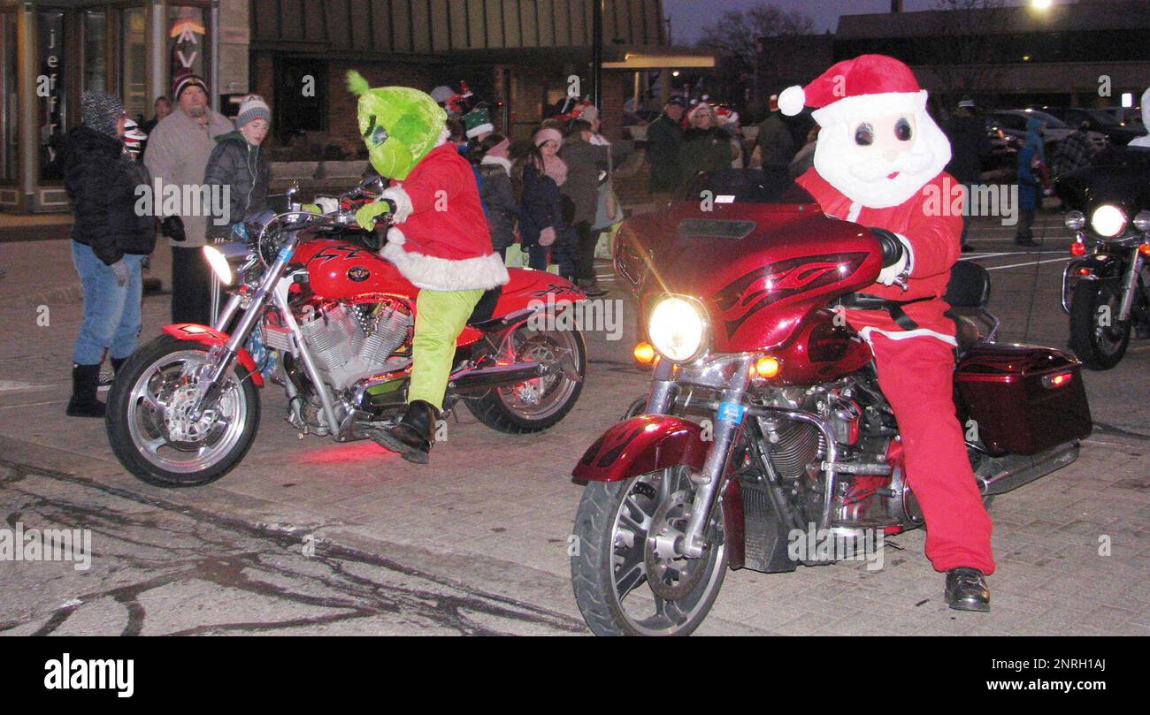 Santa and the Grinch set their differences aside and celebrate the ...
