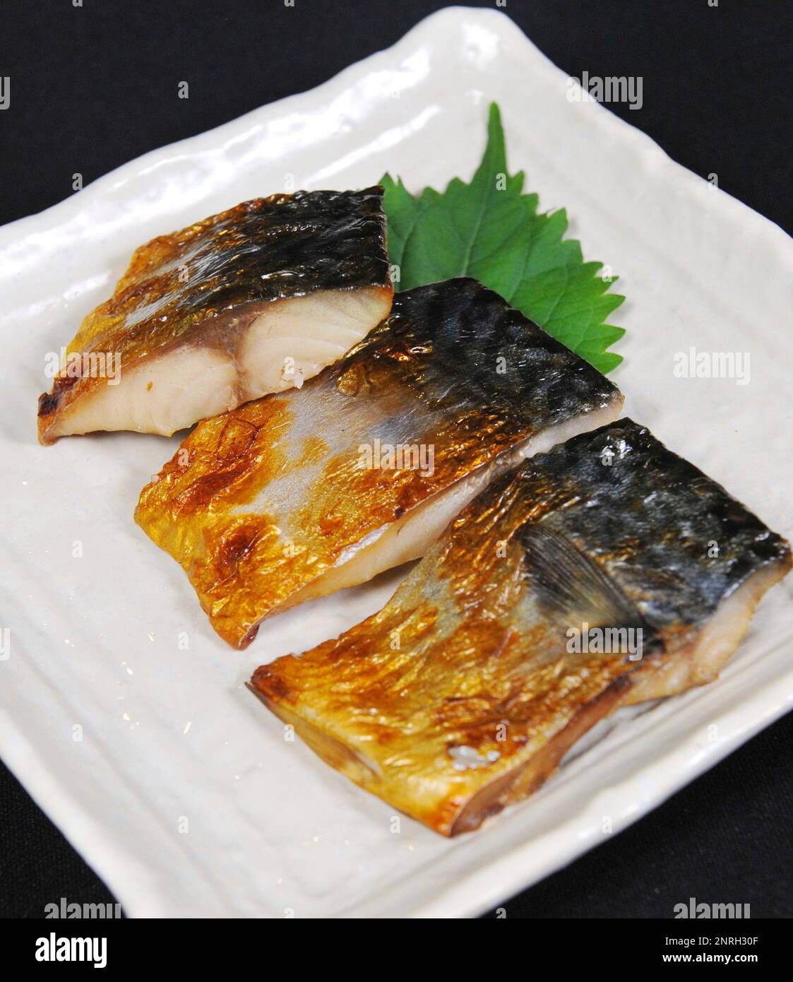 A picture taken on Nov. 8, 2019 in Tokyo shows grilled salted mackerel ...