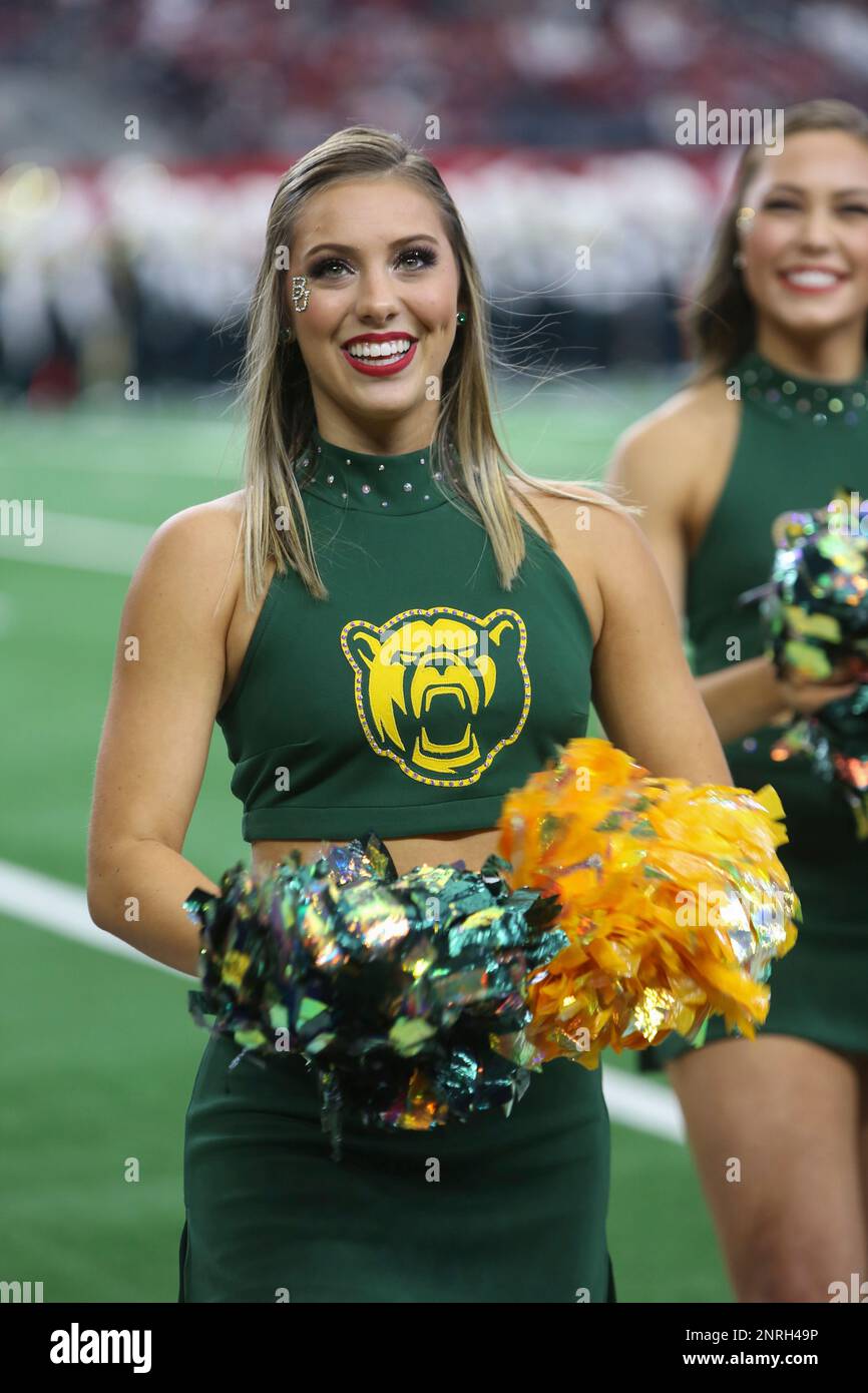 ARLINGTON, TX - DECEMBER 07: A Baylor cheerleader entertains the crowd ...