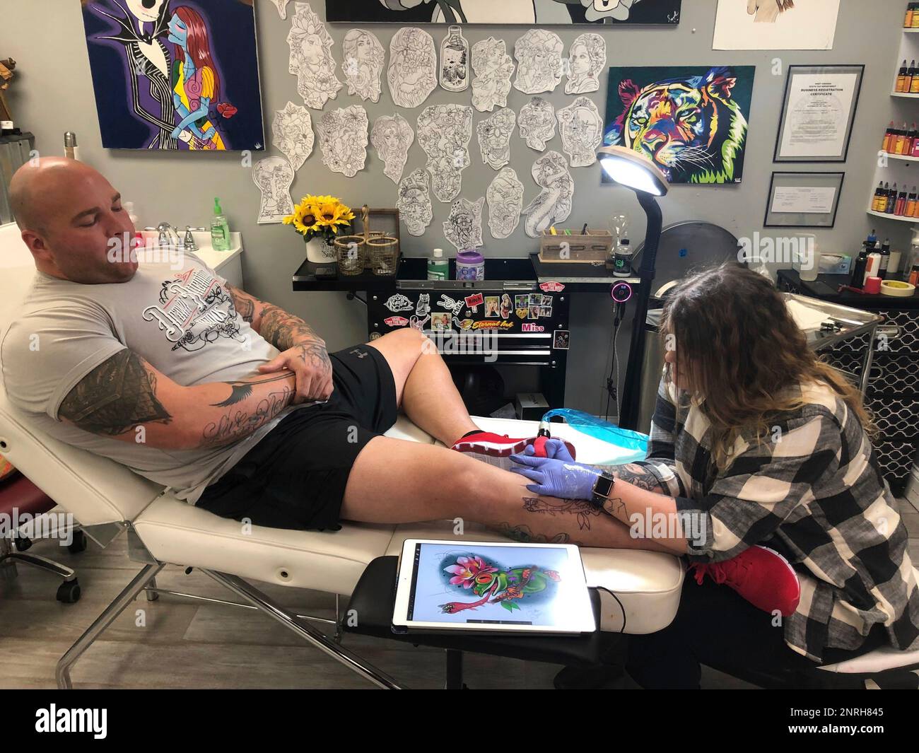 In this Dec. 1, 2019, photo, Travis Williams, of Hedgesville, gets a ...