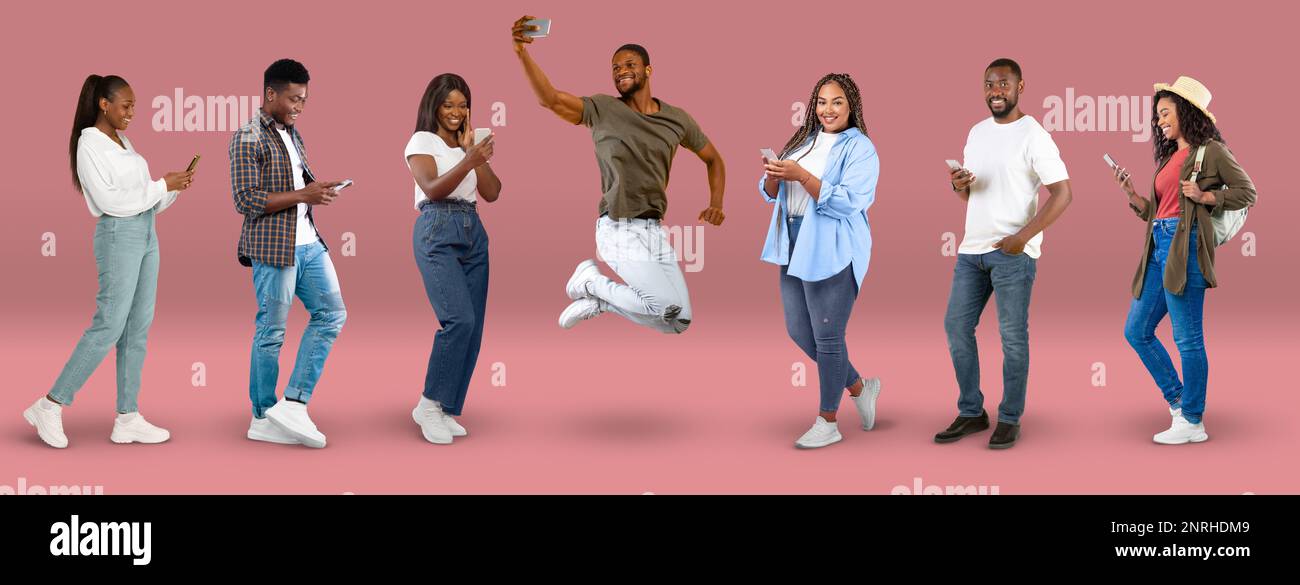 Happy millennial black people in casual chatting on smartphone, taking ...