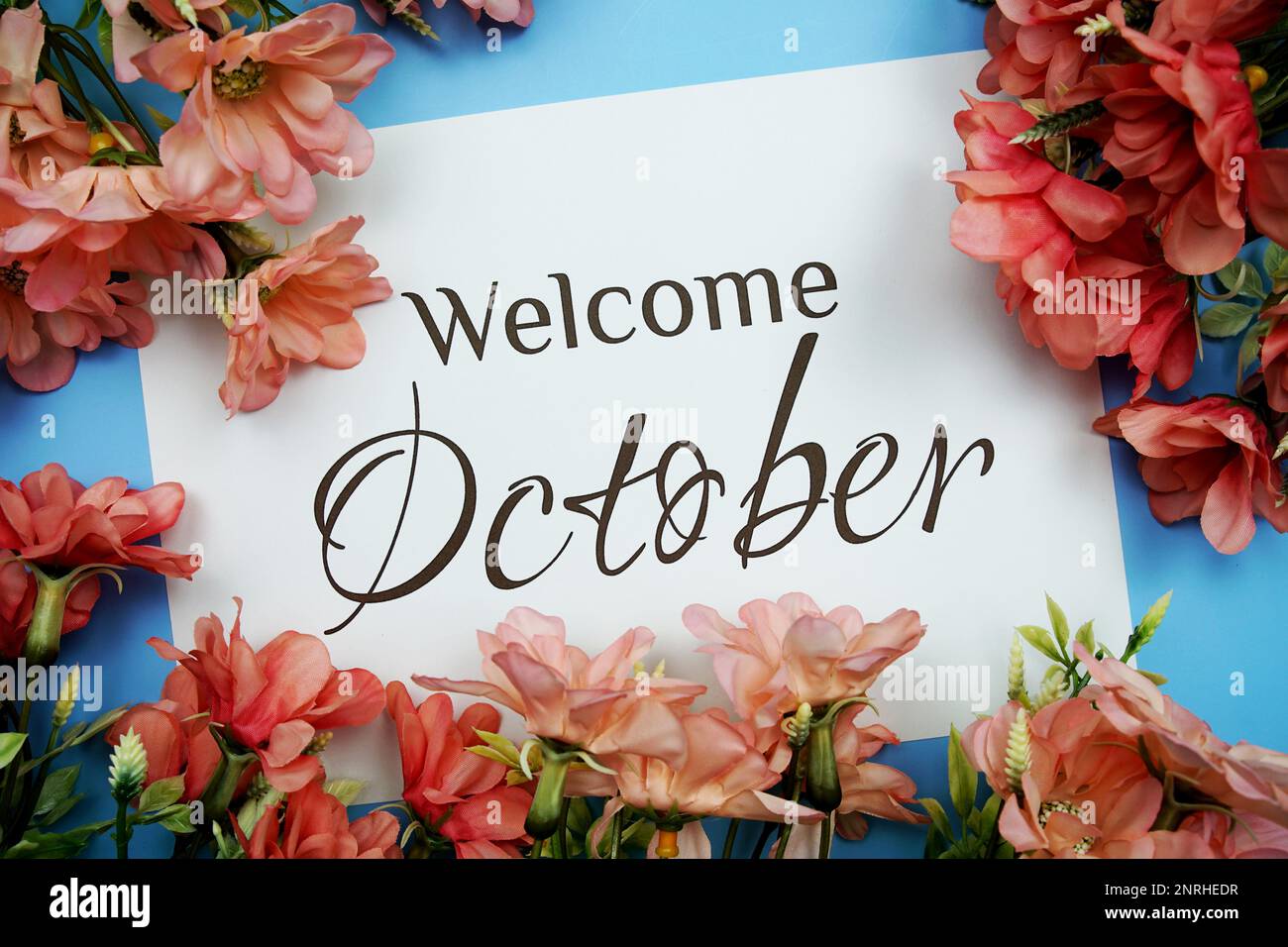 Welcome October text with Pink Flower frame on blue background Stock ...