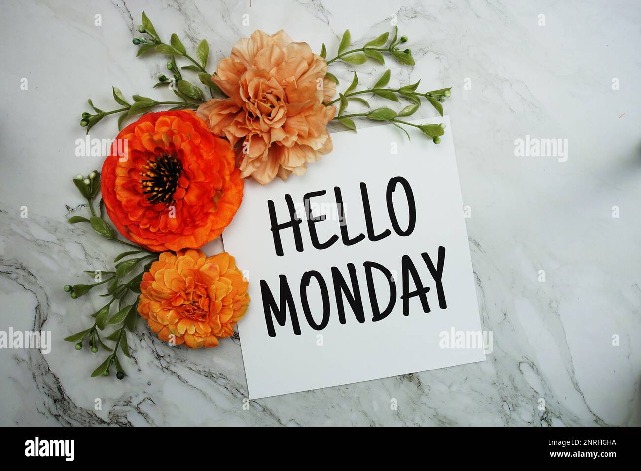 Hello Monday Text With Orange Flower Bouquet On Marble Background Stock
