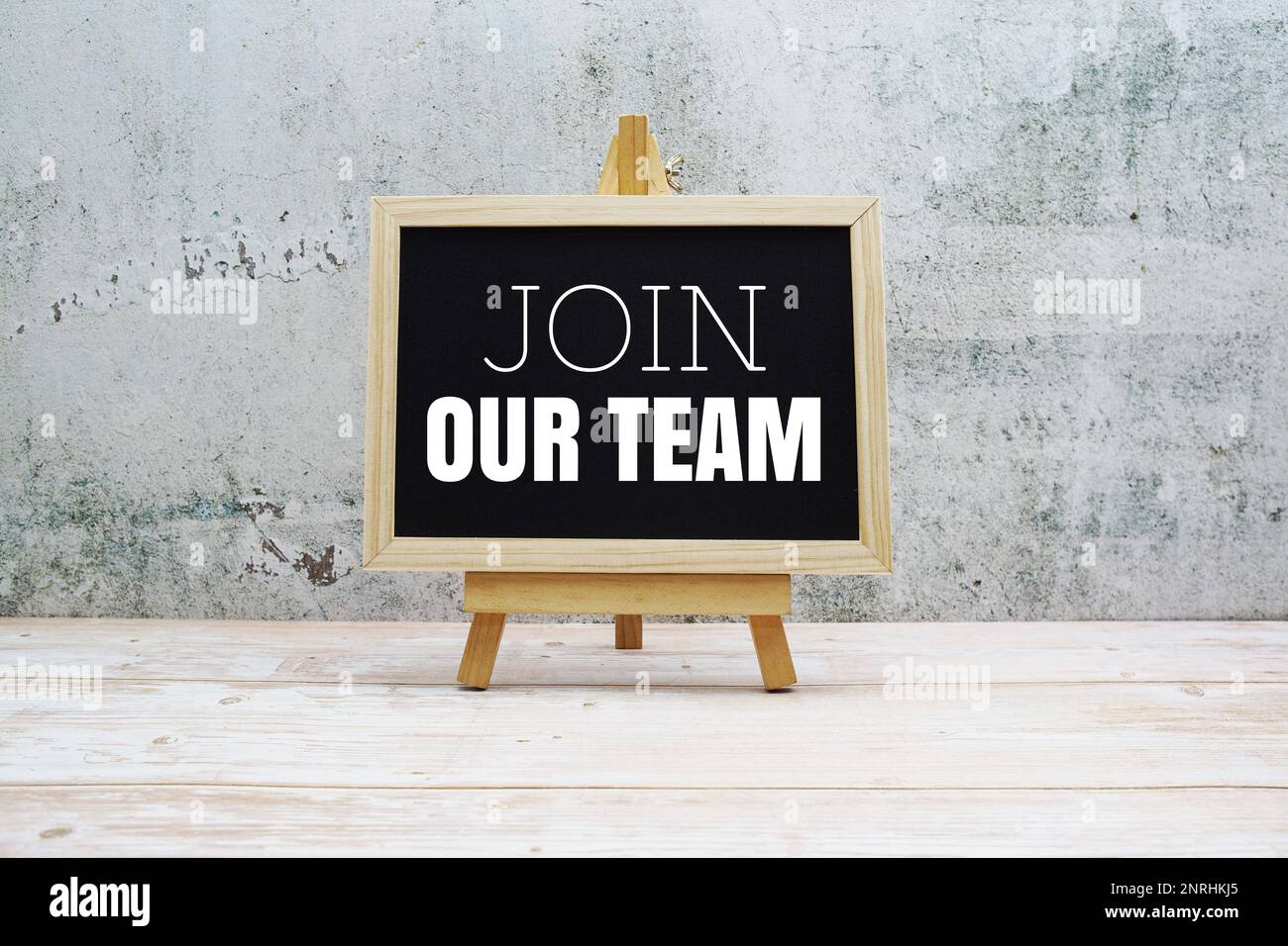 Join Our Team typography text on the blackboard set on wooden floor and ...