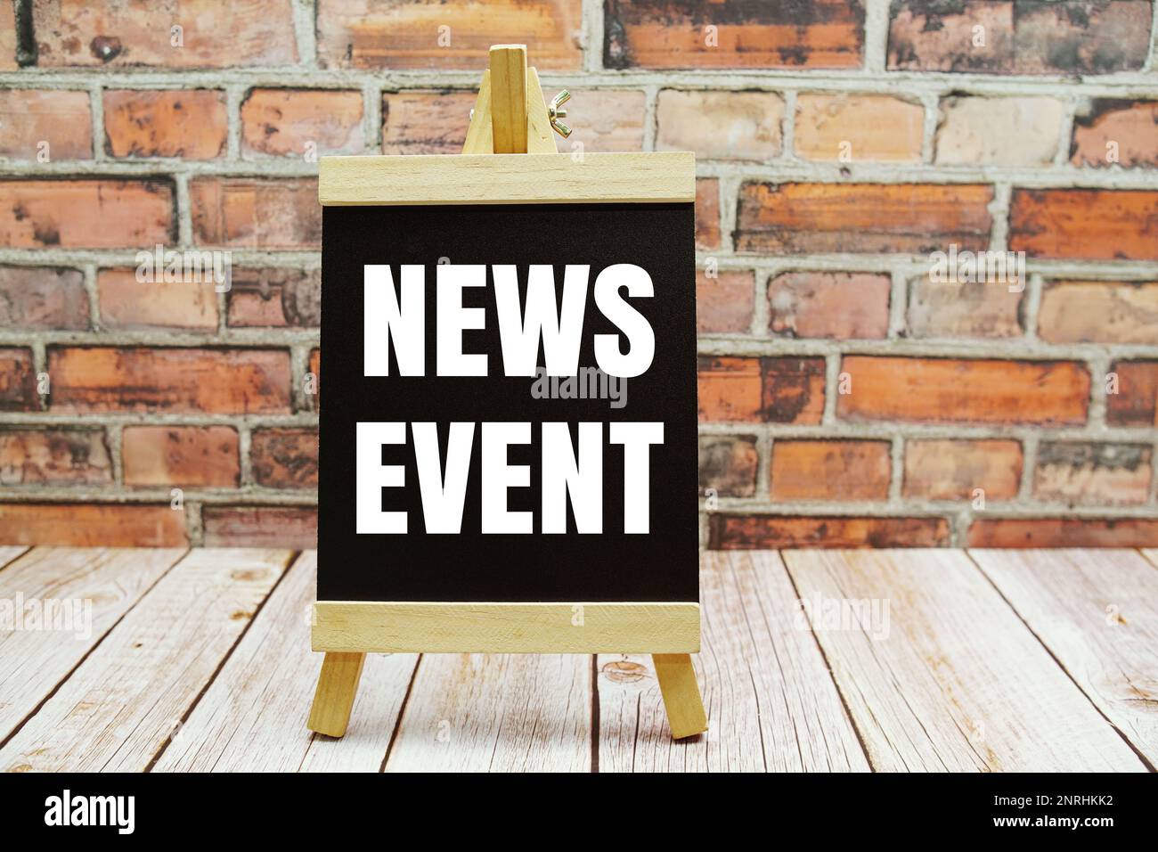 News Event typography text on the blackboard set on wooden floor and ...