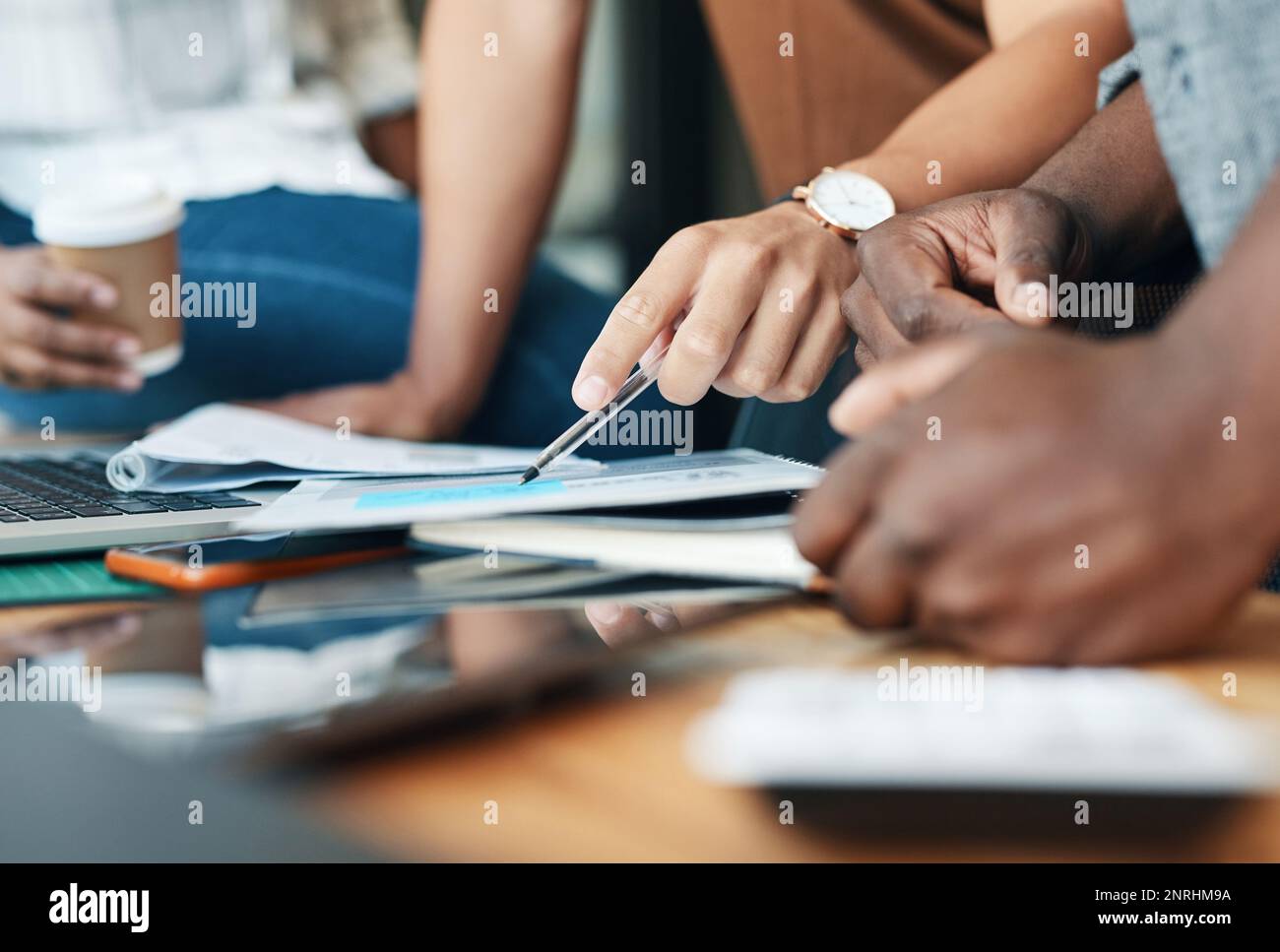 Lets refer back to the notes. a group of unrecognizable businesspeople ...