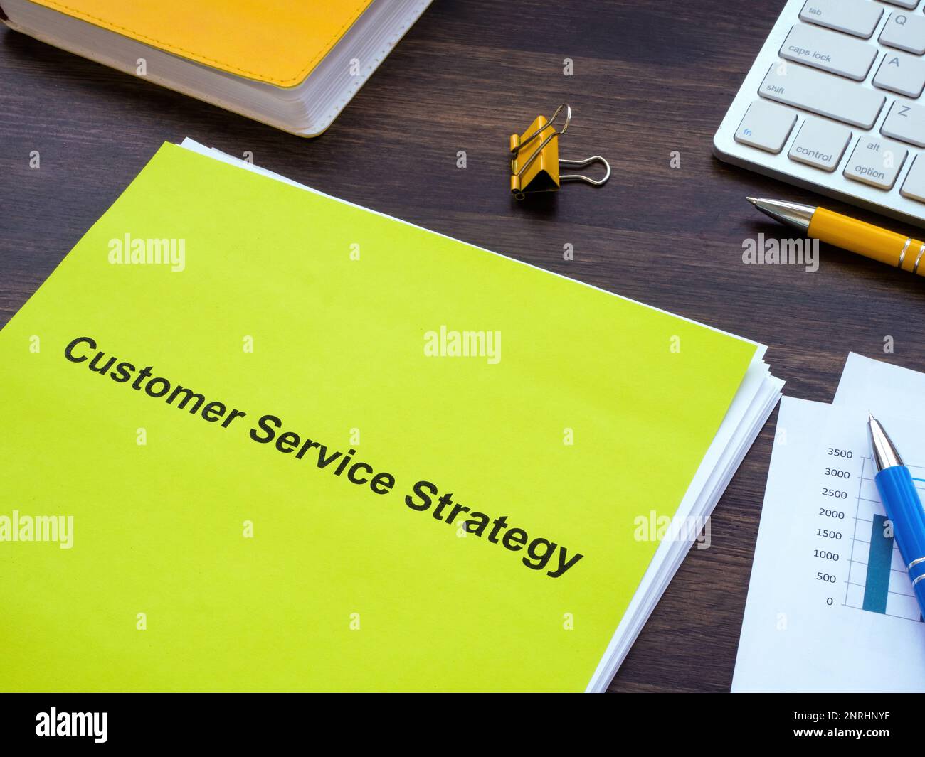 Customer Service strategy on the office desk Stock Photo - Alamy