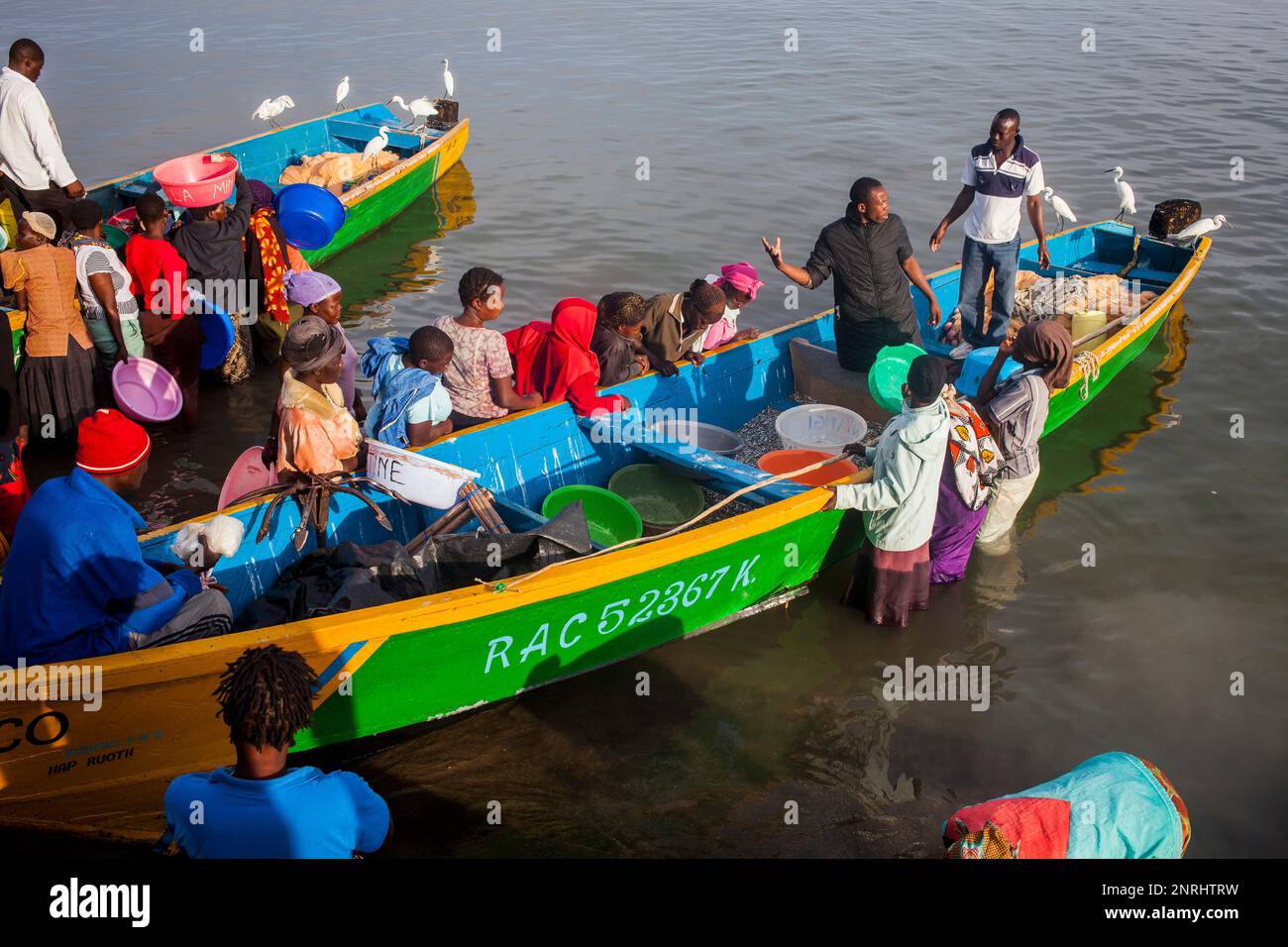 Arrival of the fishermen at port, the fishing village of Litari ...