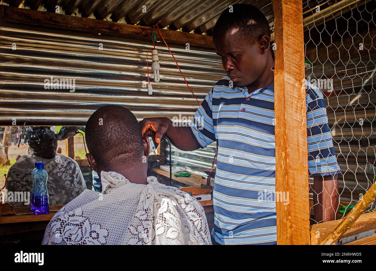 barbershop, in the fishing village of Kolunga, Rusinga Island, Lake ...