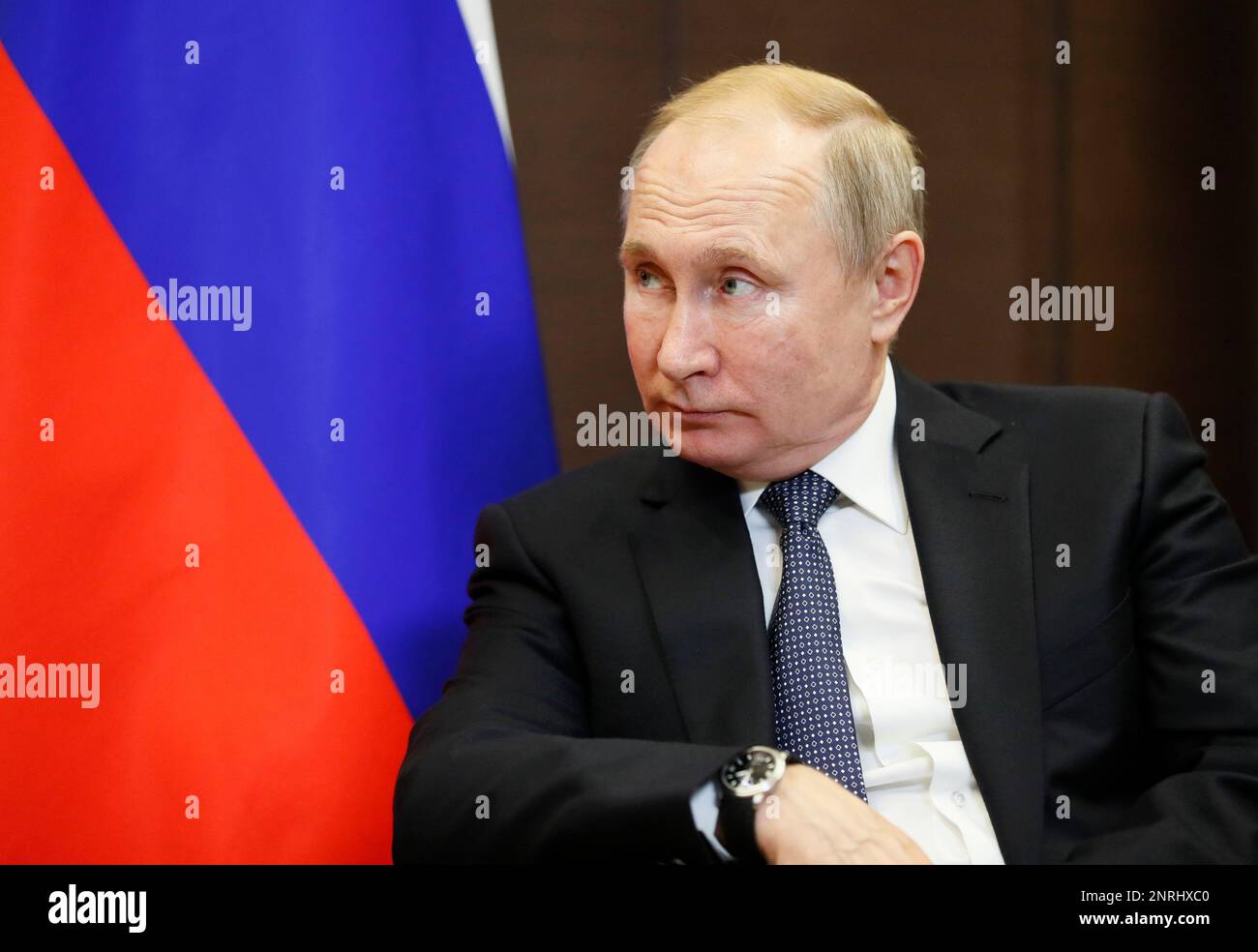 Russian President VladimirPutin listens to Serbian President Aleksandar ...