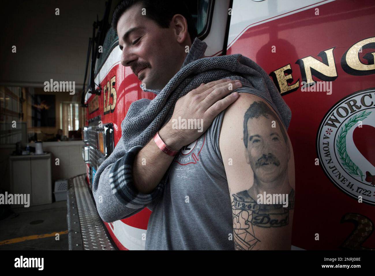 In this Oct. 30, 2019 photo, Jerry Lucey shows a tattoo he has of his ...