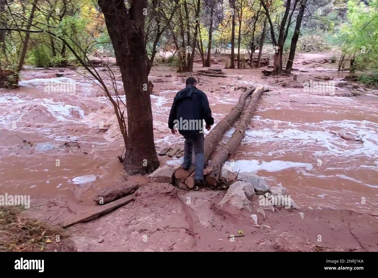 In this Nov. 29, 2019, photo, an unidentified man is seen crossing a ...