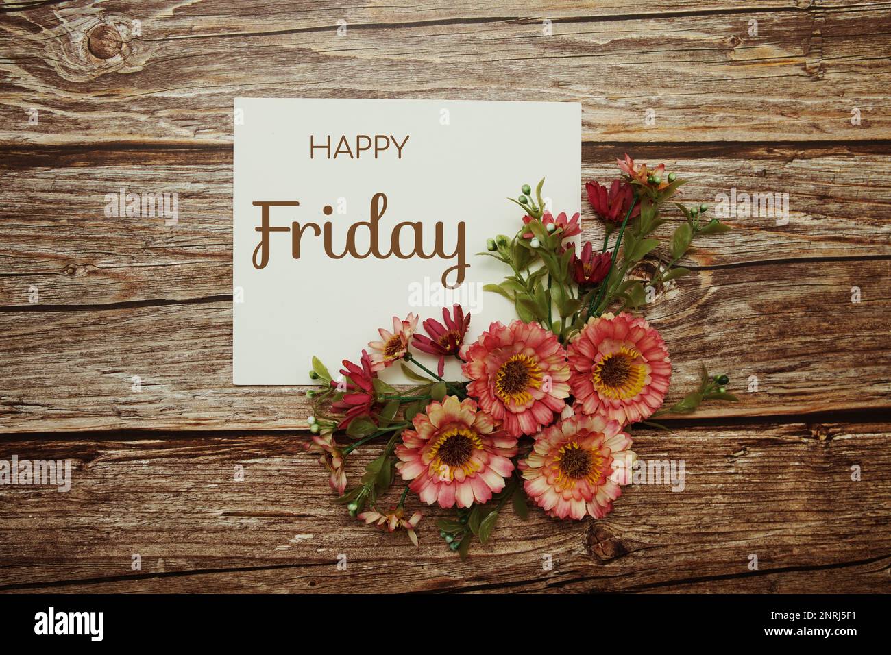 Happy Friday typography text with flowers on wooden background Stock ...