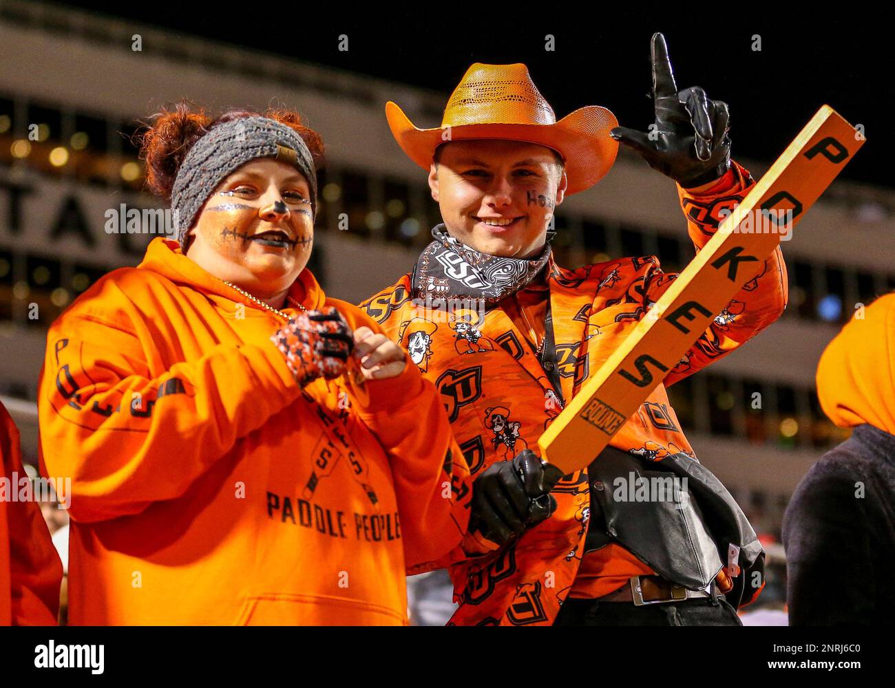 November 30, 2019: Oklahoma State Paddle People cheer on the Cowboys ...