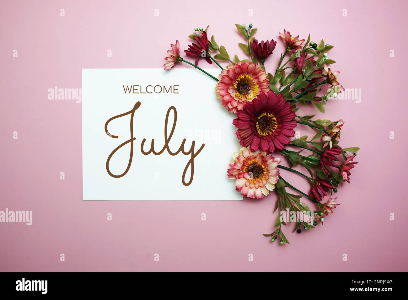Welcome July typography text with flowers on pink background Stock ...