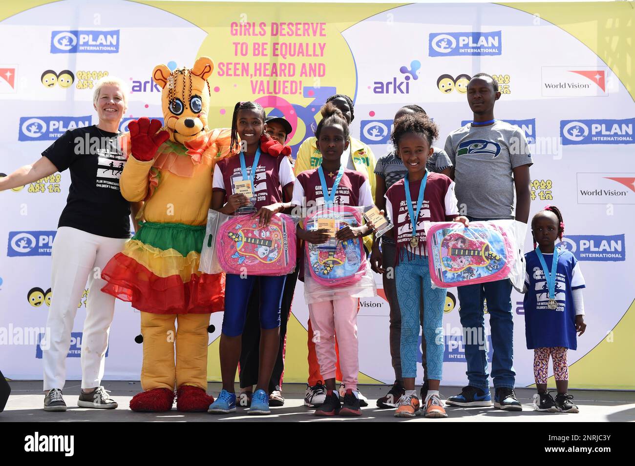 Participants in the Kid's race pose with medals at the Great Ethiopian ...