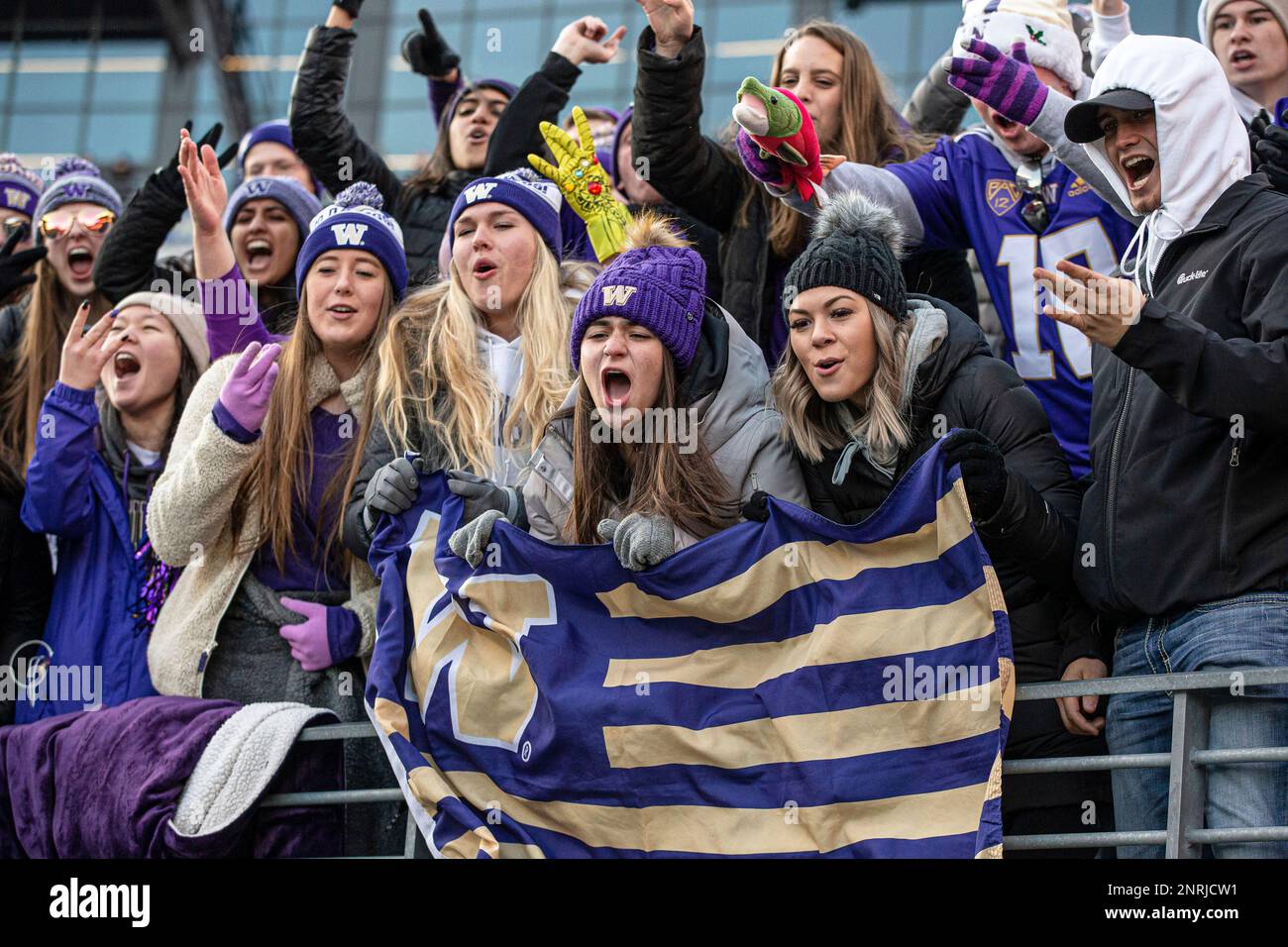 Washington Huskies fans react to a touchdown during the third quarter ...