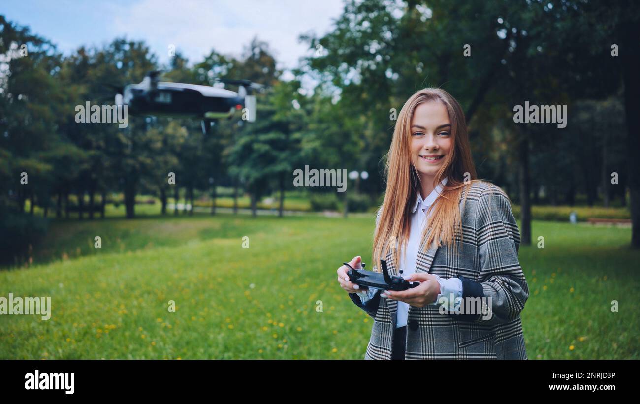 Asian female flying a drone hi-res stock photography and images - Alamy