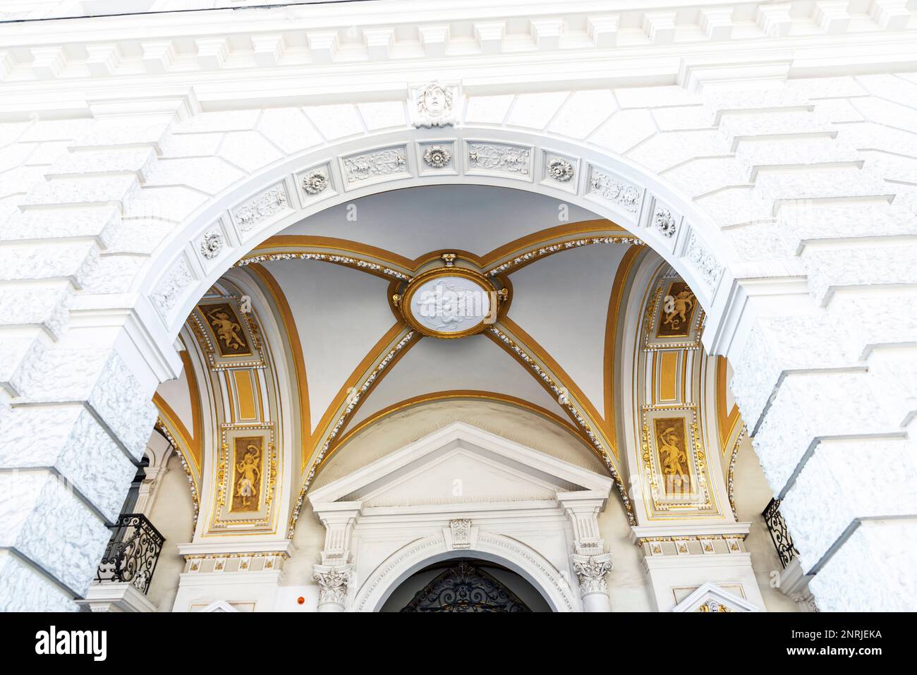 Facade of an old classic building with reliefs in Reichsratsstraße ...