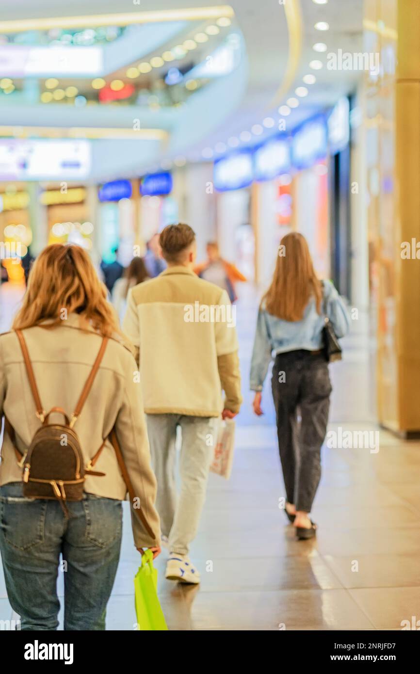 Abstract blurred background of unrecognizable young people entering ...