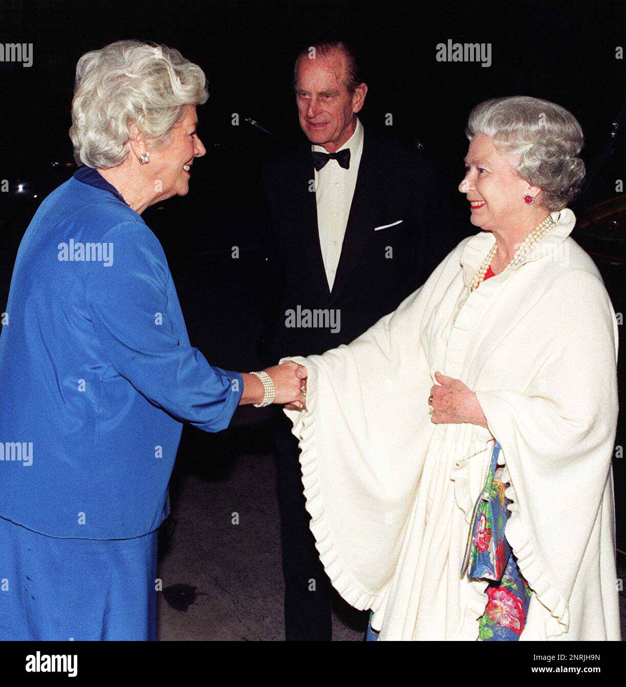 File photo dated 25/11/96 of Queen Elizabeth II (right) accompanied by ...