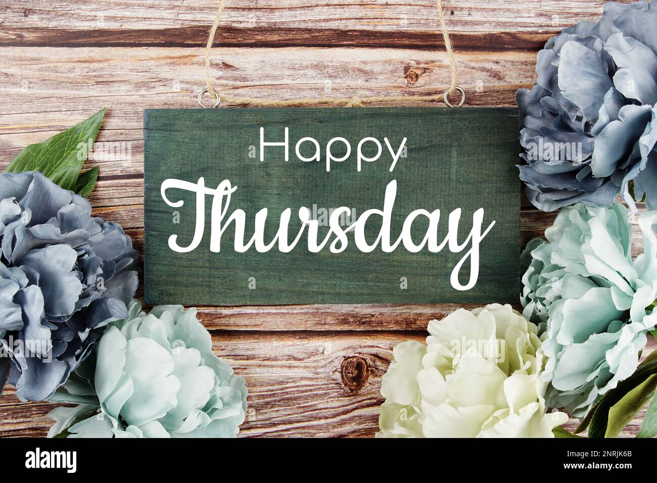 Happy Thursday typography text with pink flowers bouquet on wooden ...