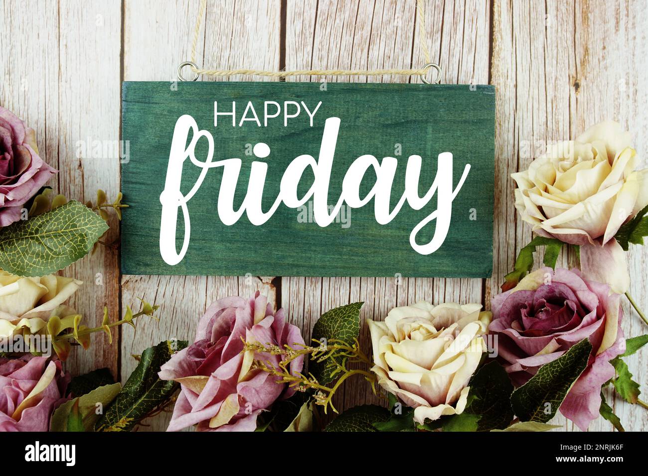 Happy Friday typography text with roses flowers bouquet on wooden ... Happy Friday typography text with roses flowers bouquet on wooden ...