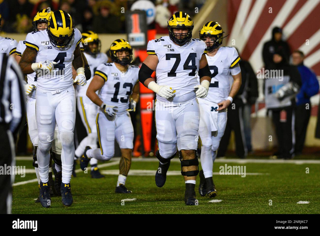 BLOOMINGTON, IN - NOVEMBER 23: Michigan (OL) Ben Bredeson (74) running ...