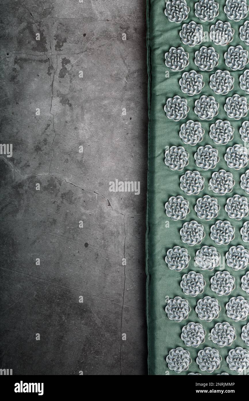 Massage mat with prickly spikes Kuznetsov applicator top view. On a ...