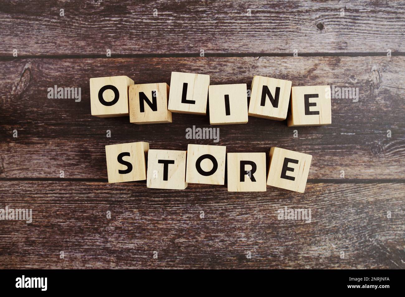 Online Store word alphabet letters on wooden background Stock Photo - Alamy
