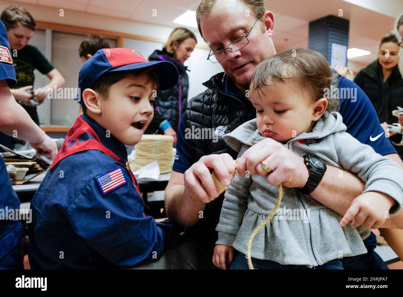 In this Friday, Nov. 22, 2019 photo, Michael LaRue helps his son ...