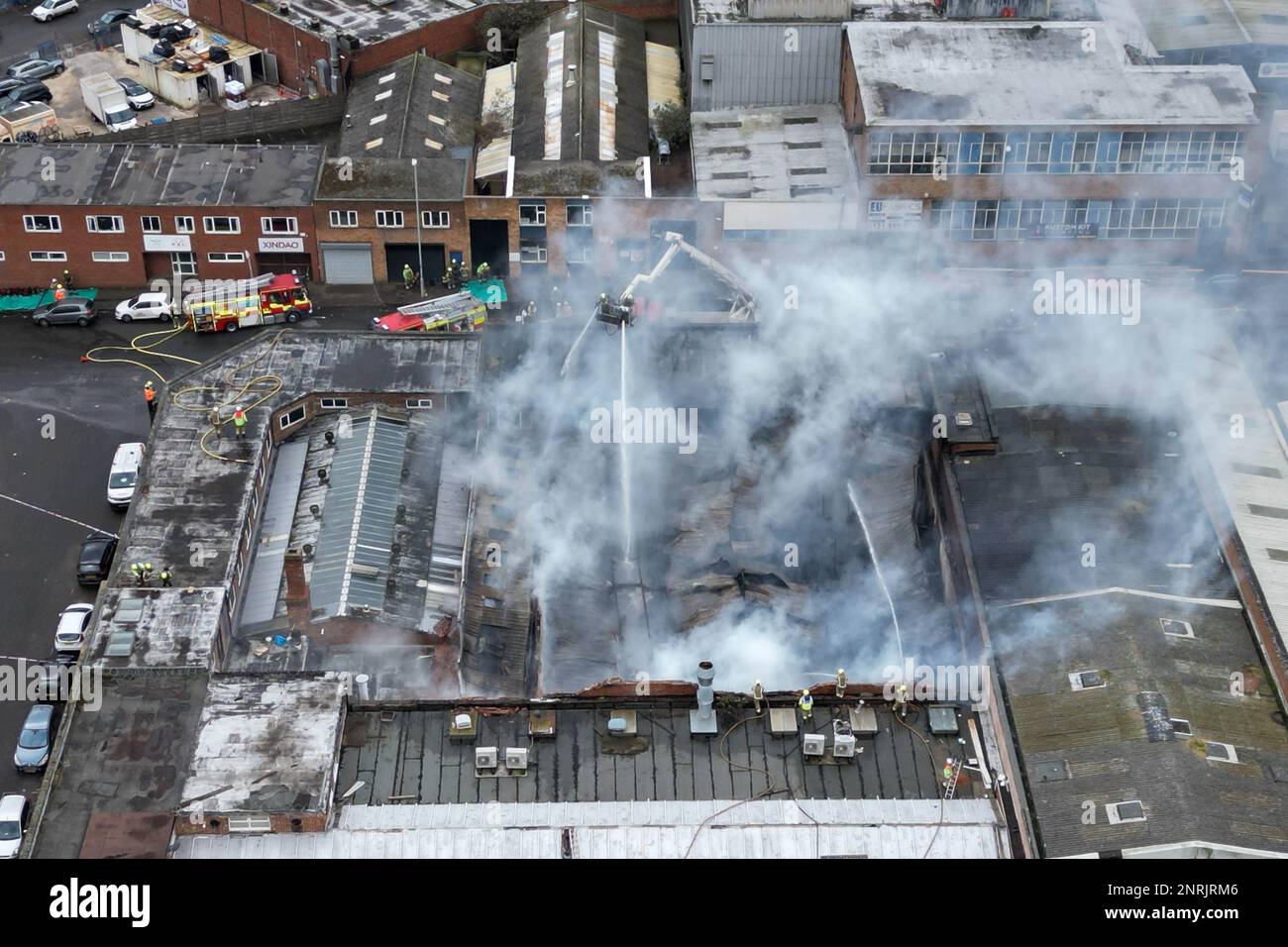 Firefighters at the scene of a two-storey warehouse fire in the Hockley ...