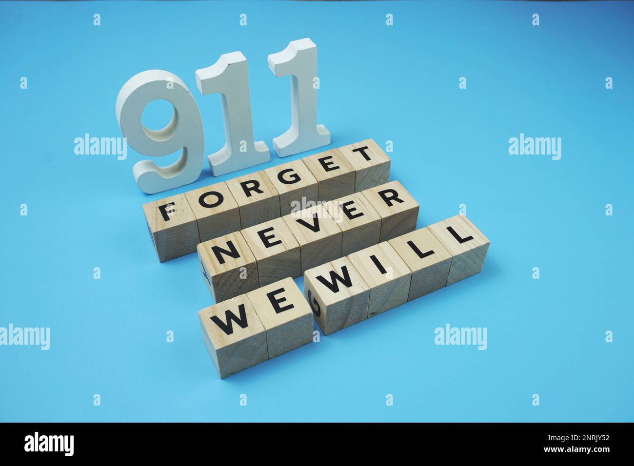911 We will Never Forget Word alphabet letters on blue background Stock ...