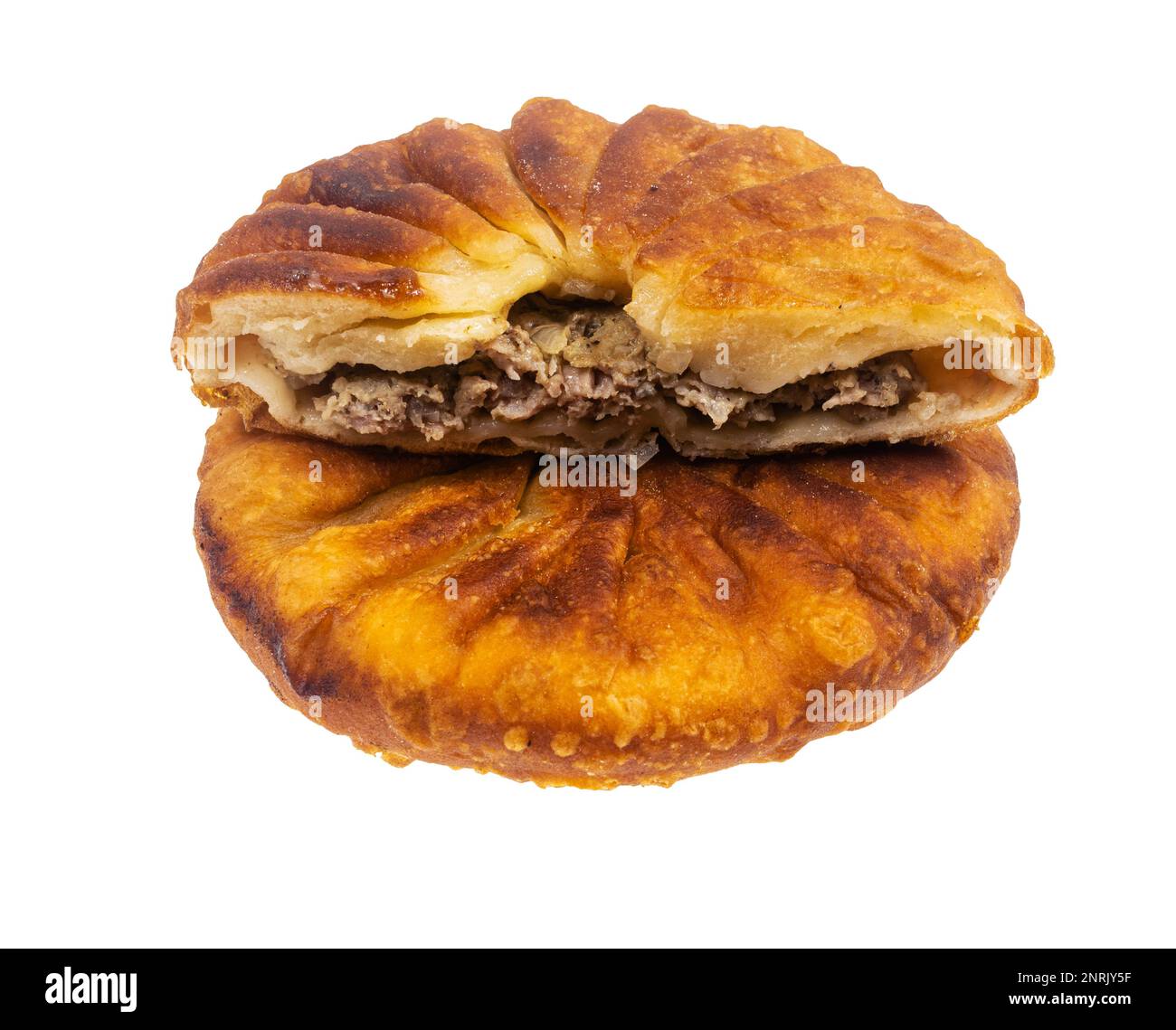 Tatar cuisine - whole and cut Peremech ( fried pastry stuffed with ...