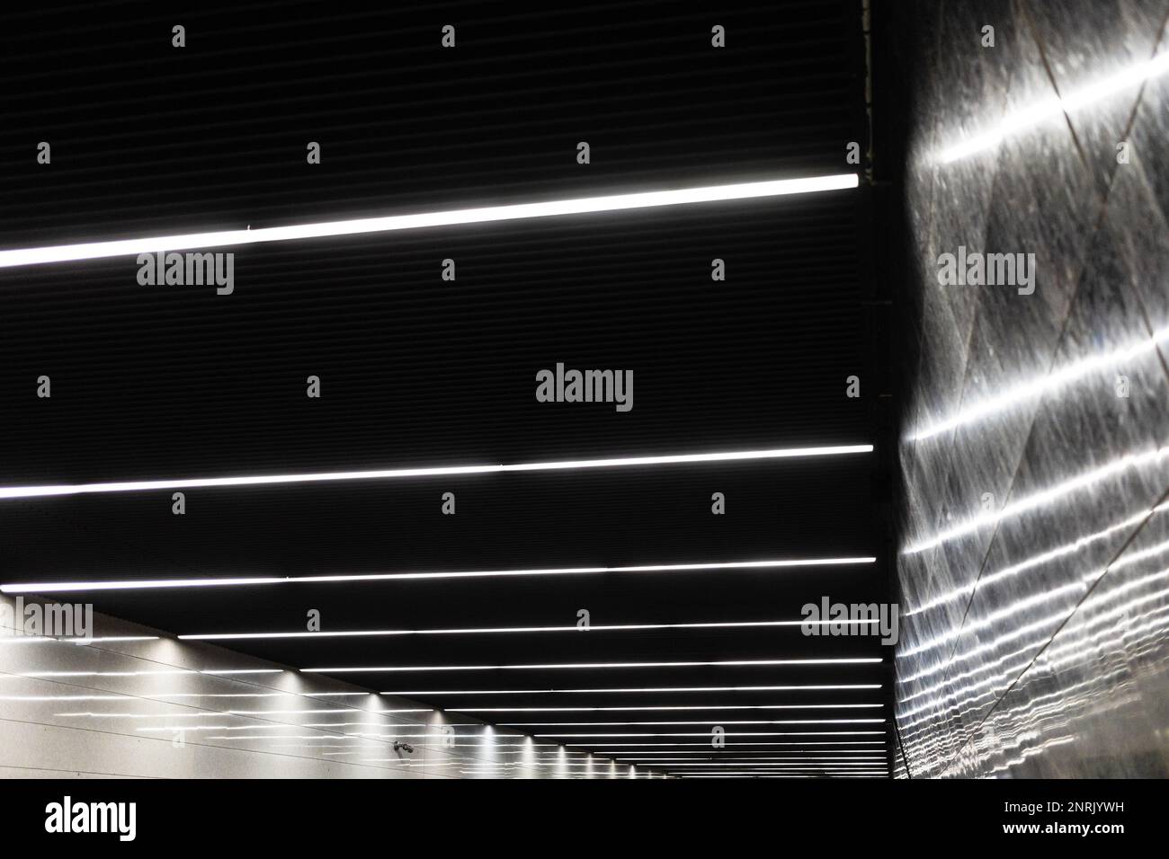 abstract illumination on black granite ceiling and walls of underground ...