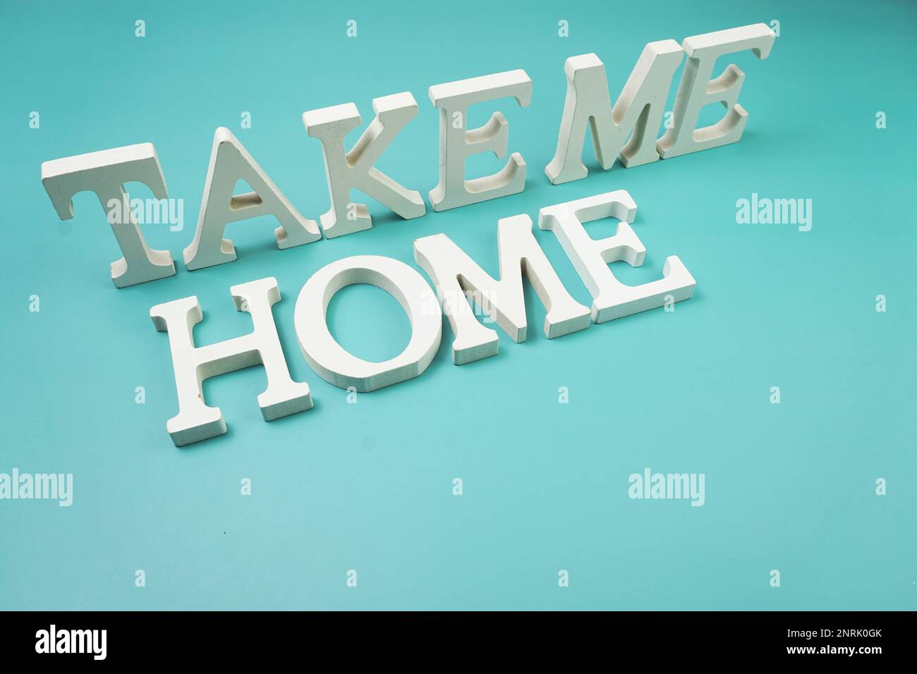 Take Me Home word alphabet letters on blue background Stock Photo - Alamy