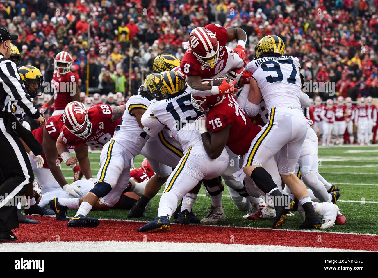 BLOOMINGTON, IN - NOVEMBER 23: Indiana (RB) Stevie Scott III (8) leaps over the lineman into the ...