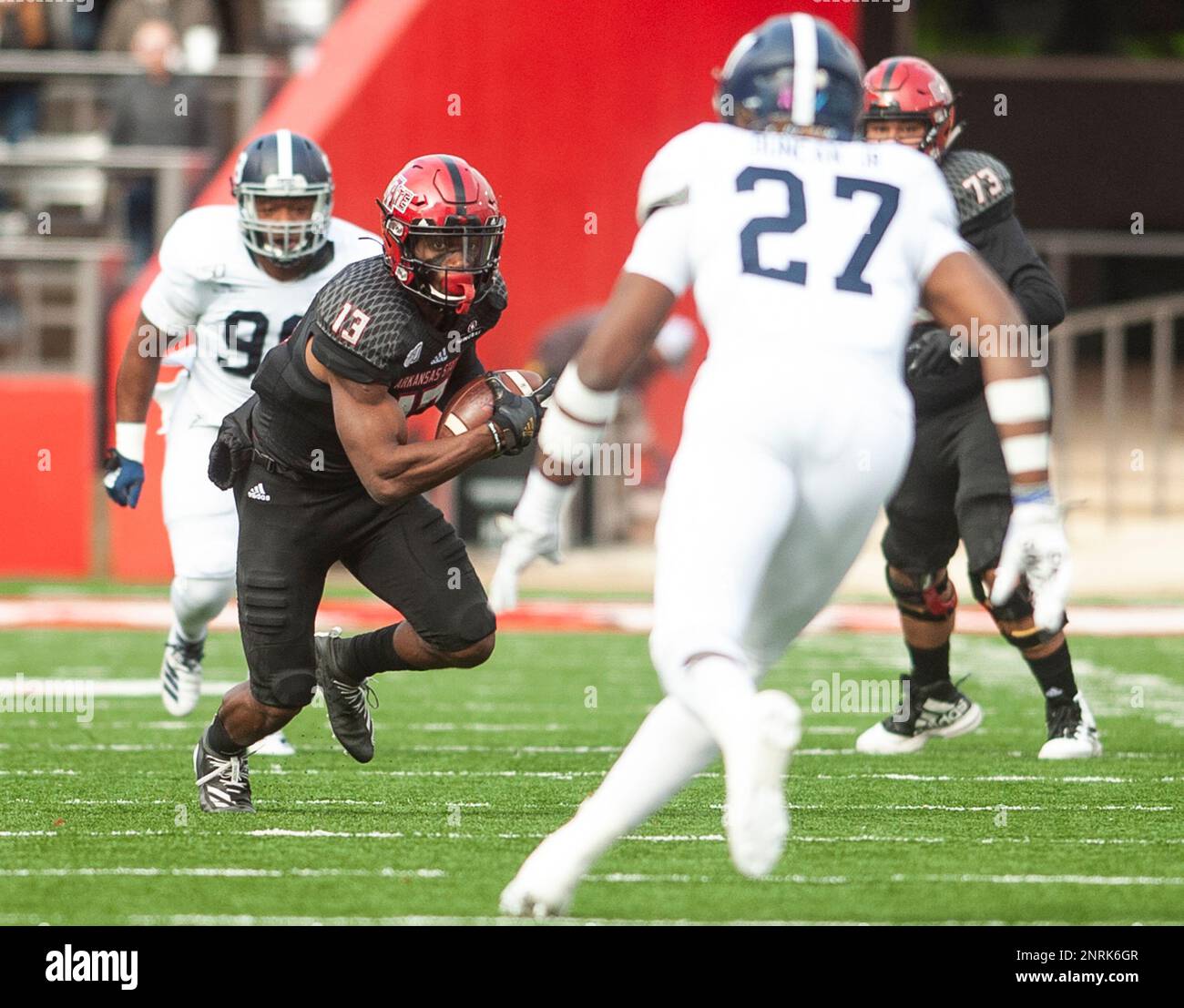 Arkansas State wide receiver Kirk Merritt (13) catches the ball and ...