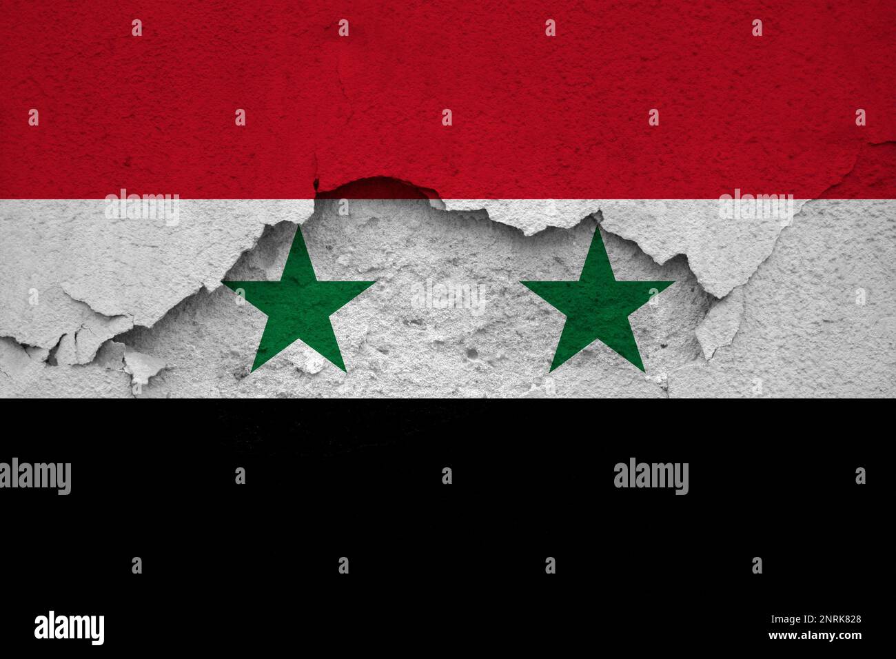 Earthquakes in Syria, flag Syria on a wall with cracks from an ...