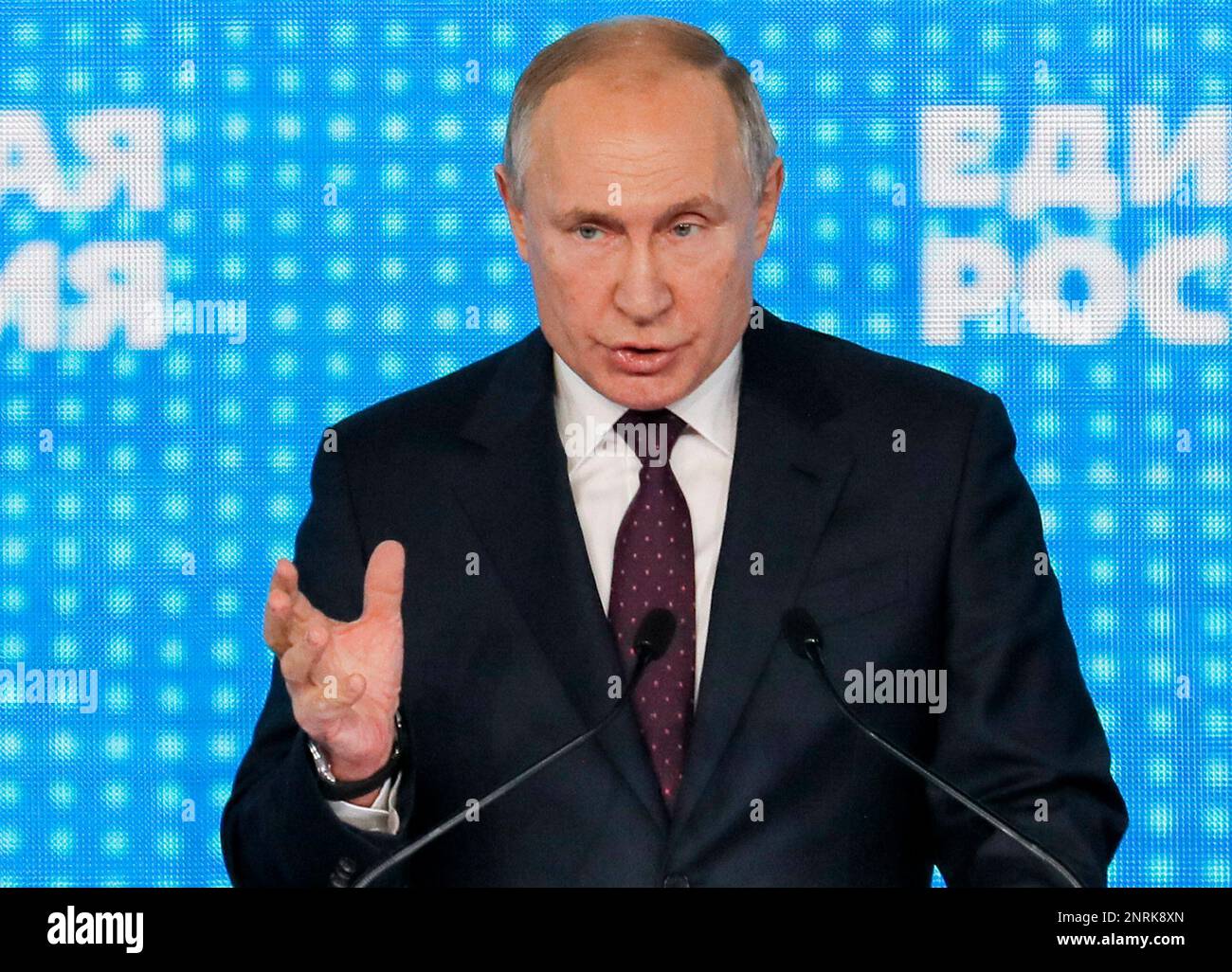 Russian President Vladimir Putin gestures as he delivers his speech at ...