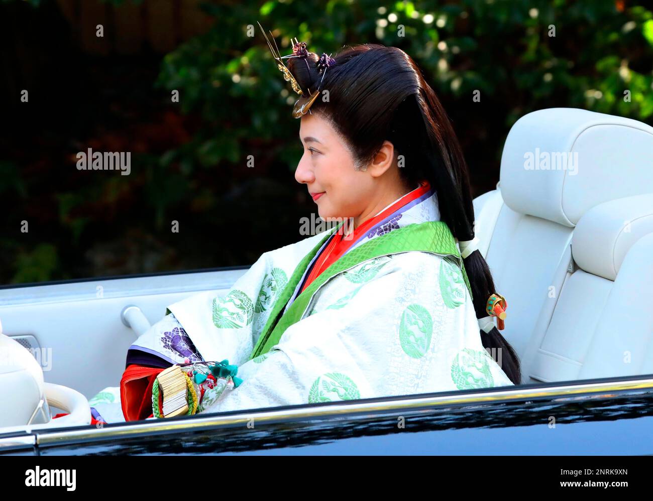 Japan's Empress Masako wearing a 12-layered ceremonial kimono visits ...