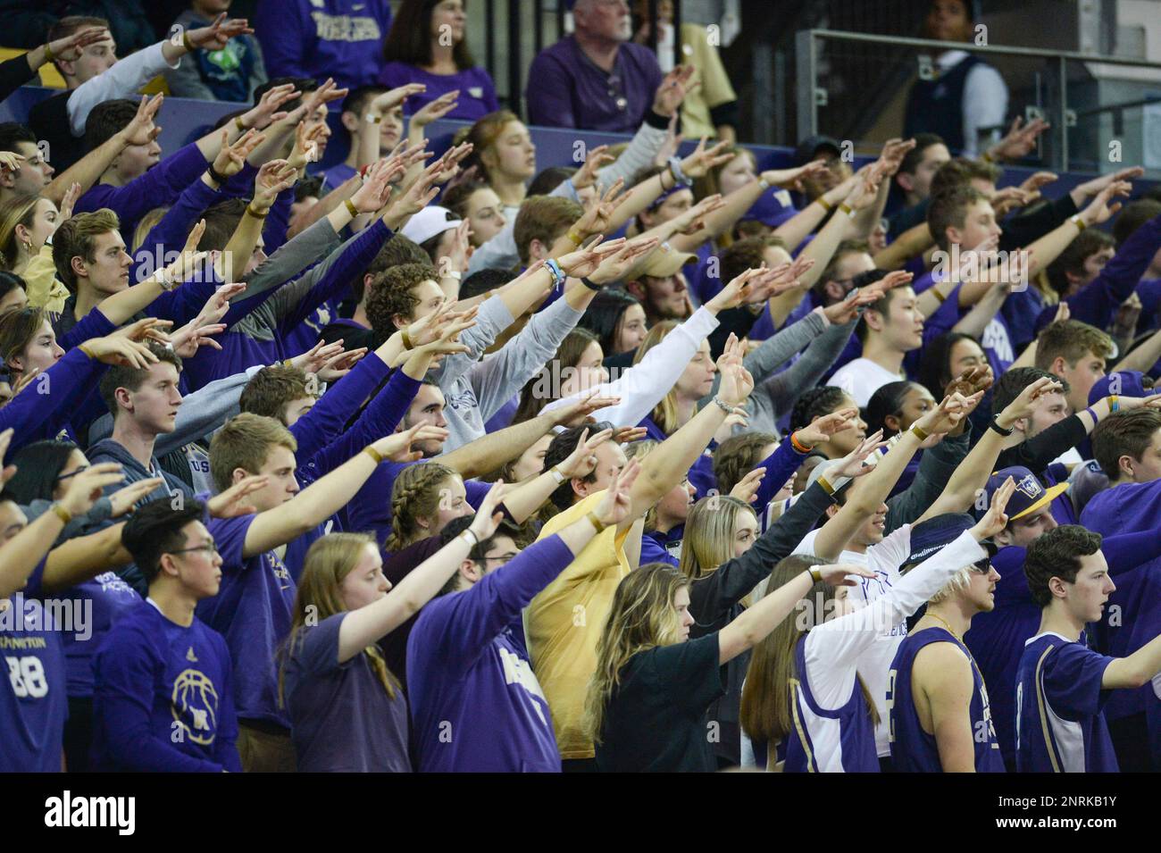 SEATTLE, WA - NOVEMBER 19: The UW student "Dawg Pack" sings and chants ...