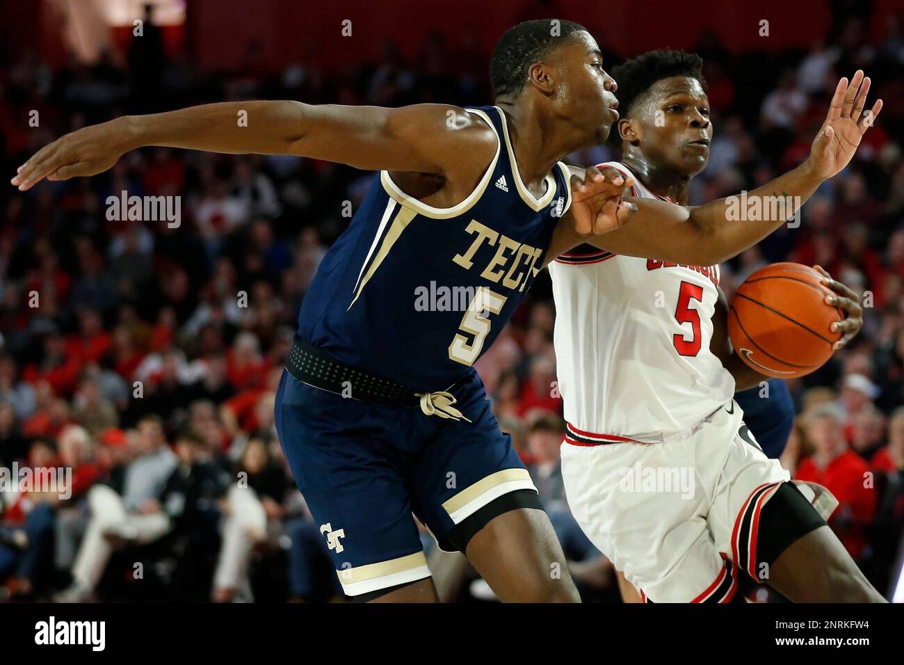Georgia's Anthony Edwards (5) tries to get the ball past Georgia Tech ...