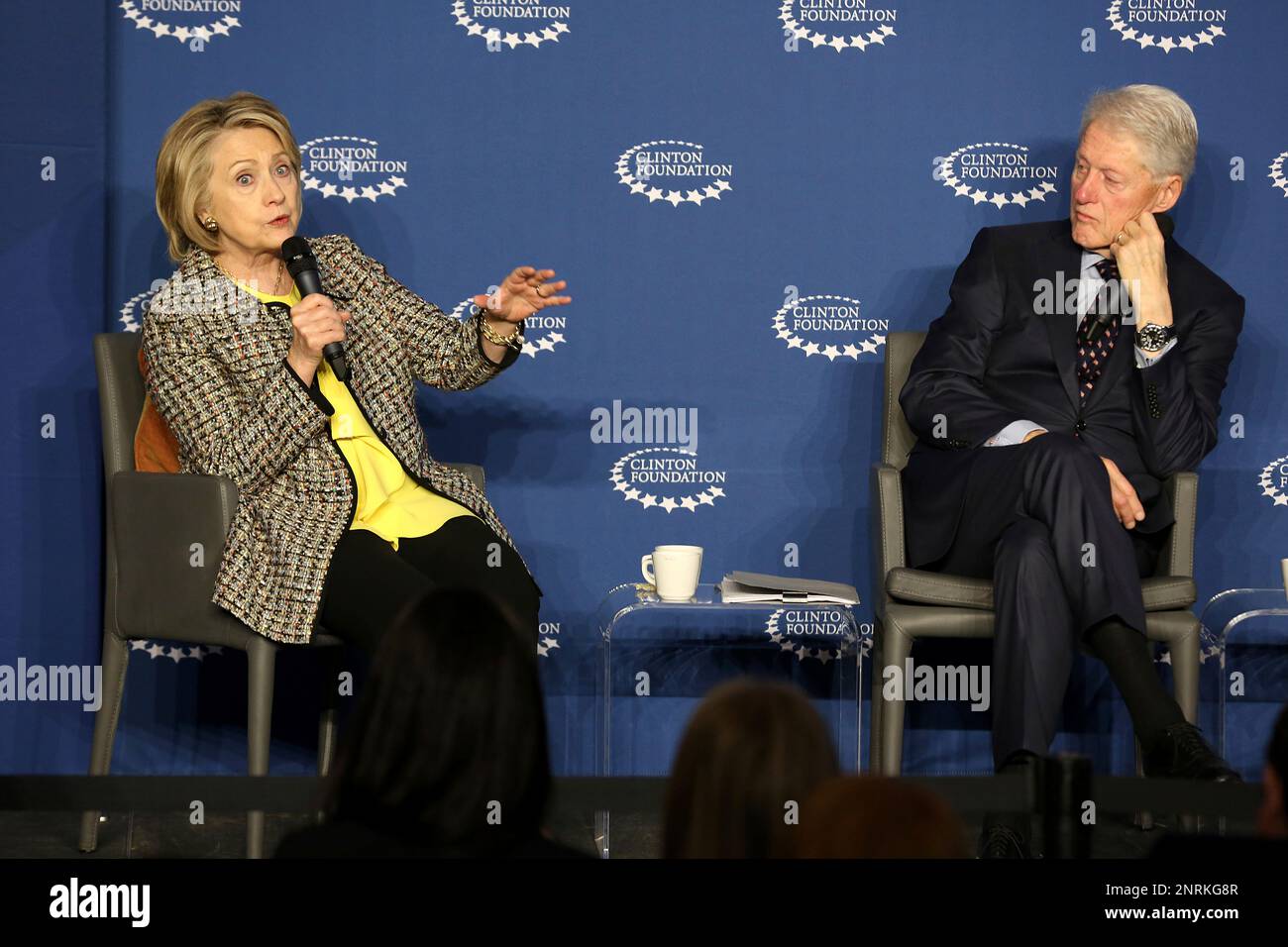 Former Secretary of State Hillary Clinton speaks as her husband, former ...